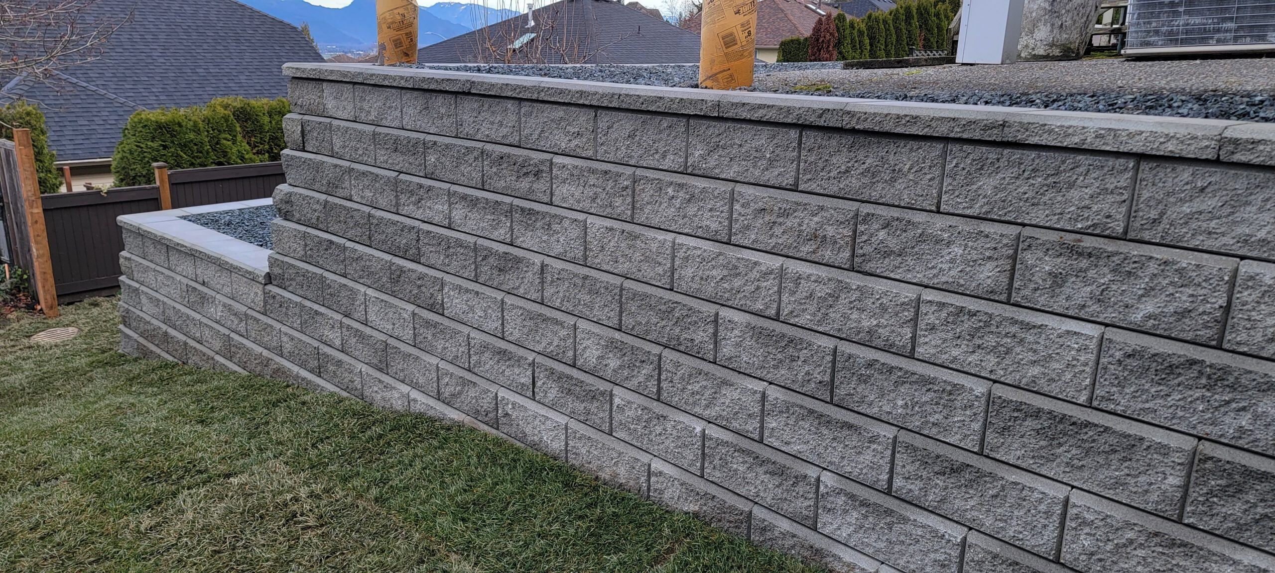 Gluing Allan Block Retaining Wall Caps and Blocks