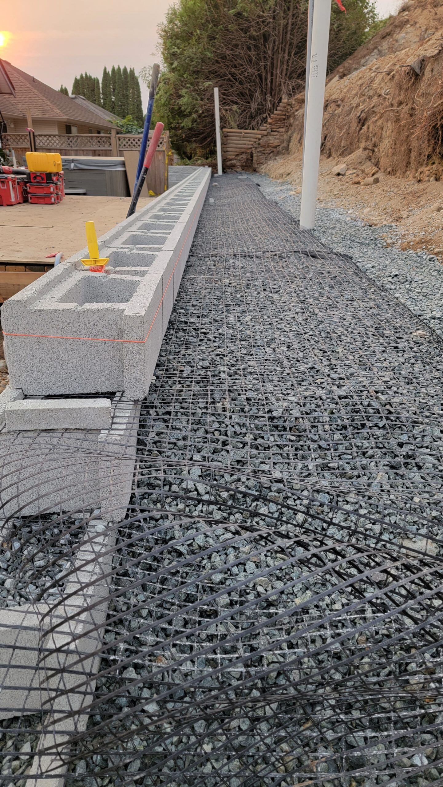 Allan Block Retaining Wall Excavation: How Much Soil Removed and Why?