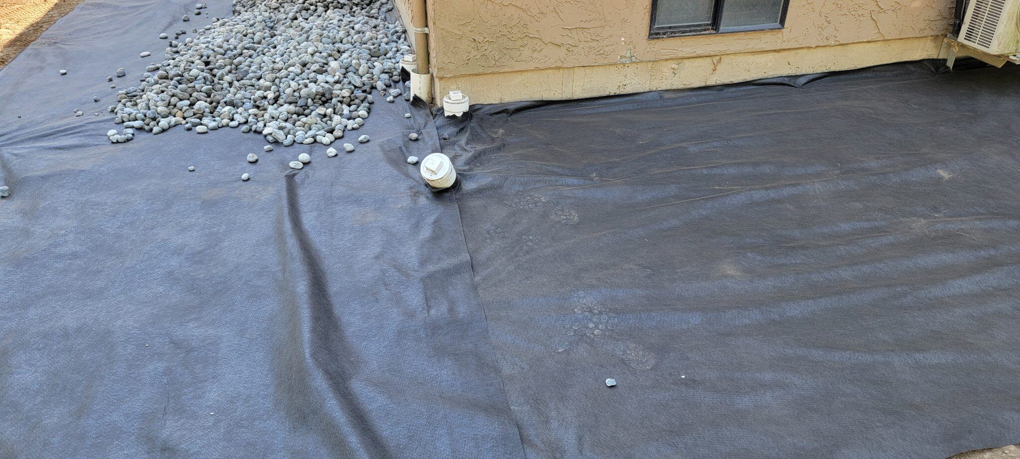 Low Maintenance Landscaping: River Rock, Rip Rap, and Mulch